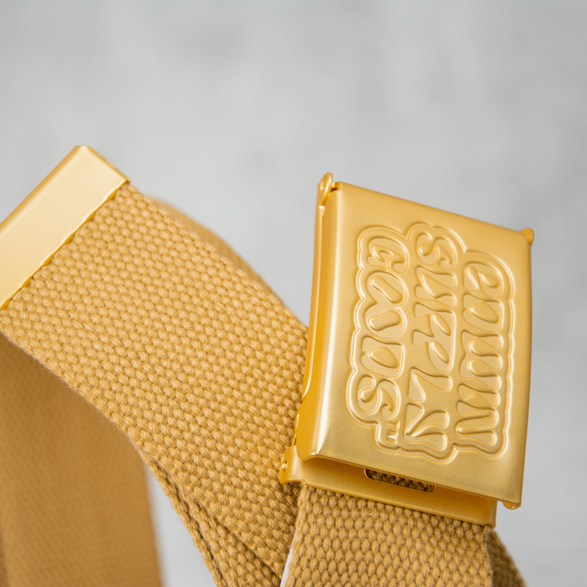 Buy the Edwin Clip Belt - Gold@Union Clothing | Union Clothing